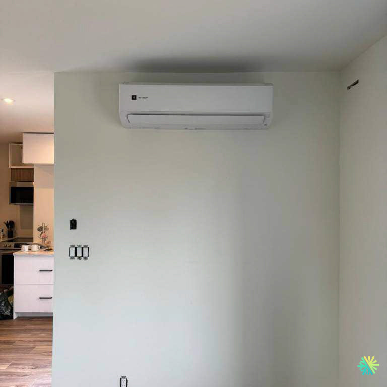 Installation of a Sharp wall-mounted air conditioner in Saint-Léonard ...
