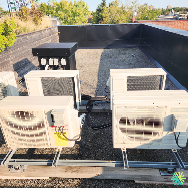 Repair of a Sharp heat pump on a rooftop terrace in Ville-Marie (Montr ...